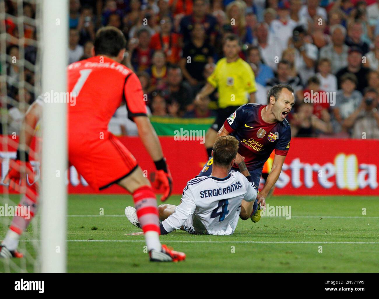 Real Madrid's Sergio Ramos, center, makes a penalty foul on FC ...
