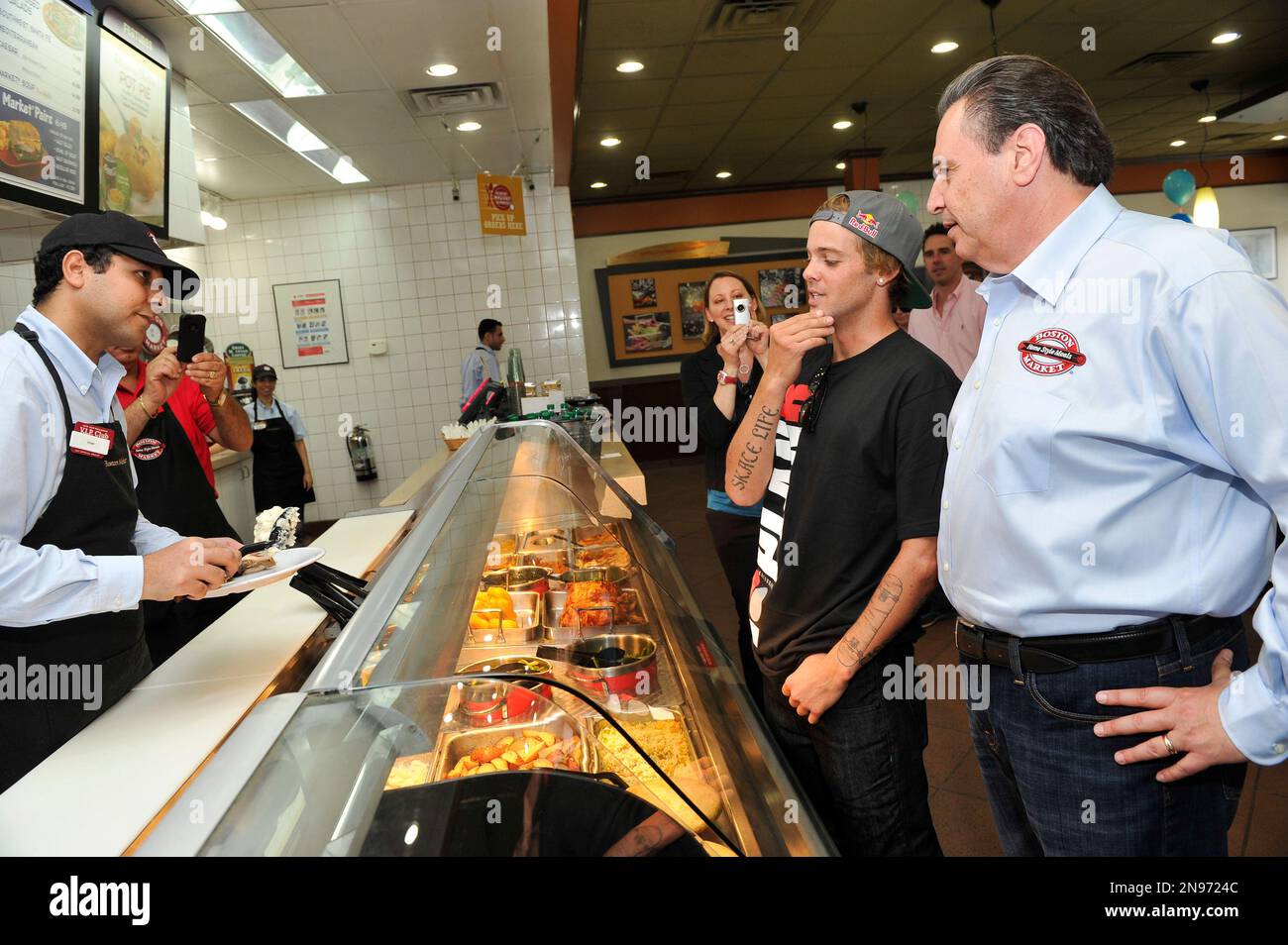Boston Market CEO George Michel (A.K.A. The Big Chicken) and pro ...