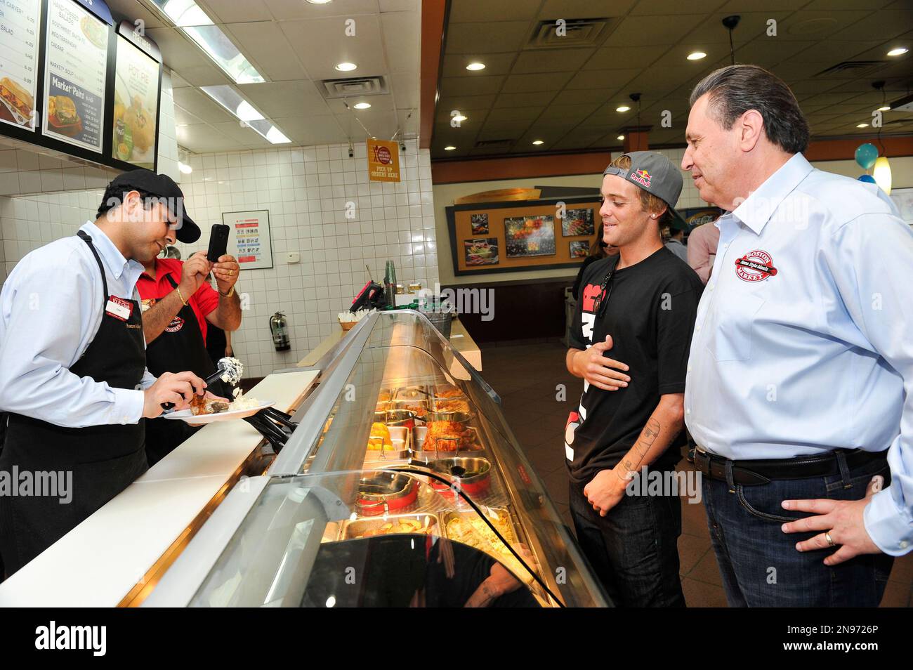 Boston Market CEO George Michel (A.K.A. The Big Chicken) and pro ...