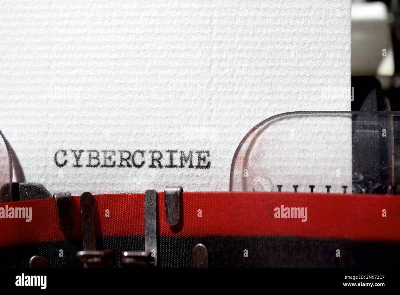Cybercrime word written with a typewriter Stock Photo - Alamy