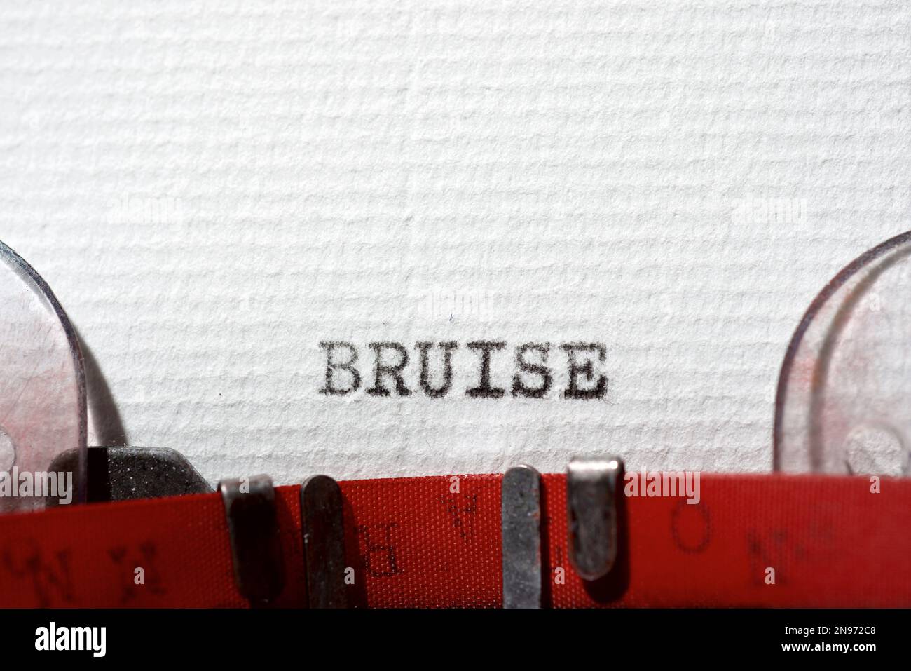 Bruise word written with a typewriter Stock Photo - Alamy