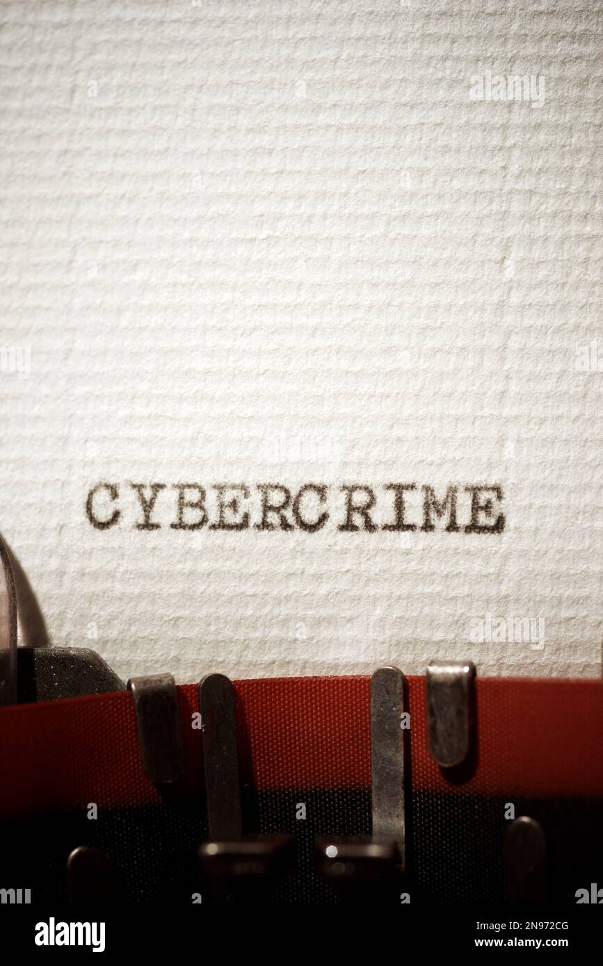 Cybercrime word written with a typewriter Stock Photo - Alamy