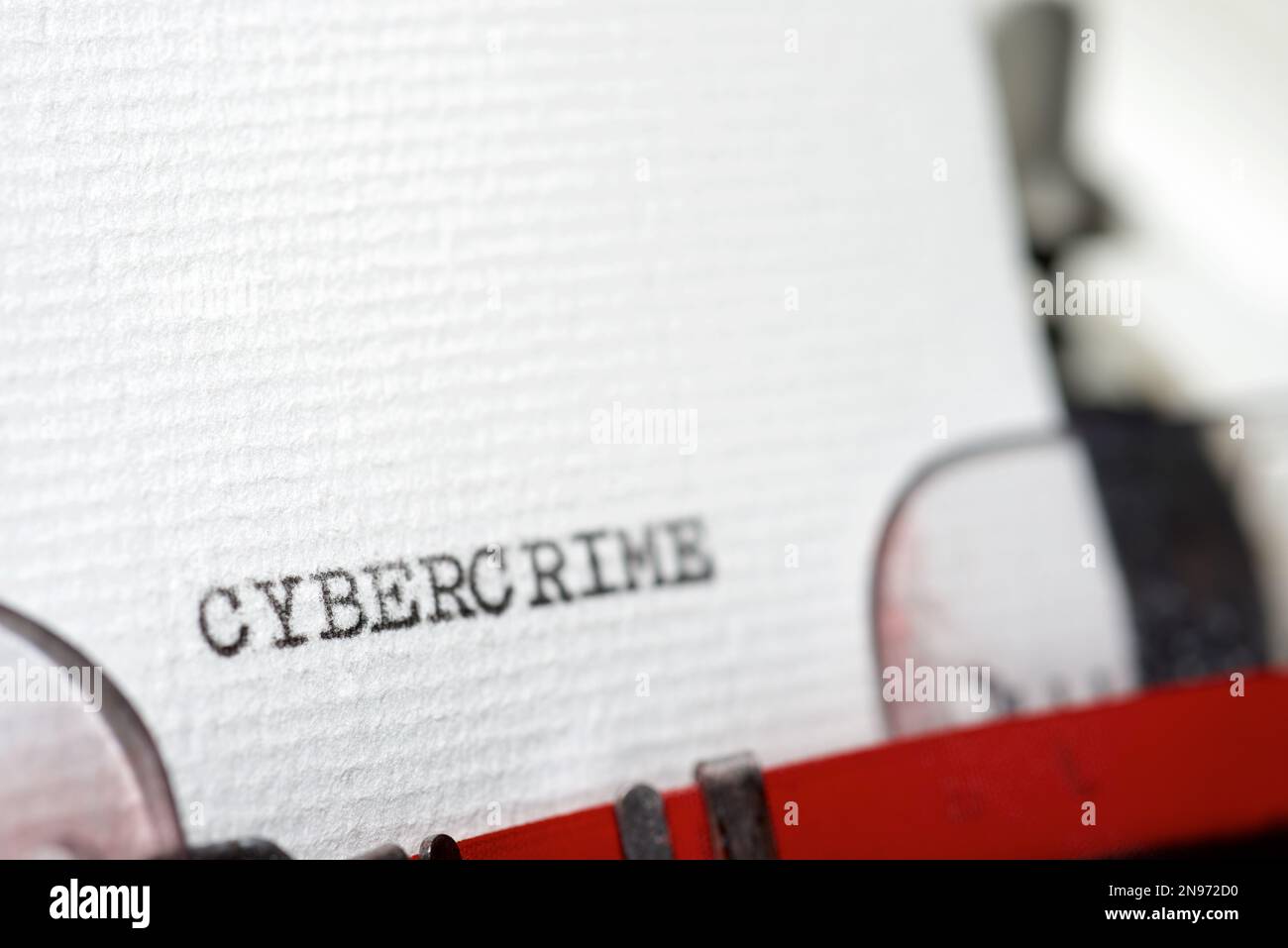 Cybercrime word written with a typewriter Stock Photo - Alamy
