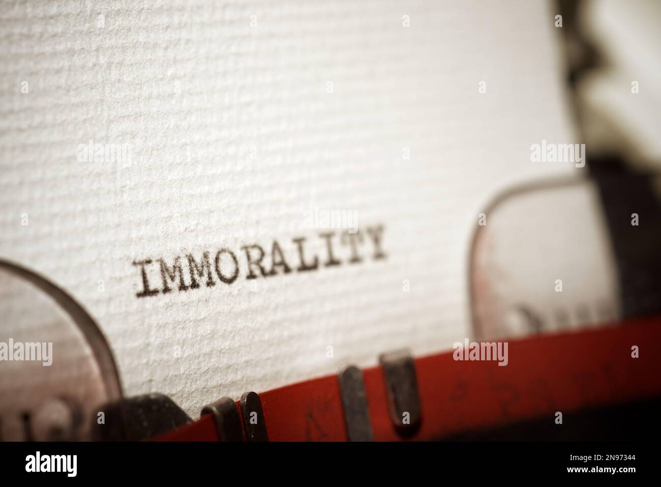Immorality word written with a typewriter Stock Photo - Alamy