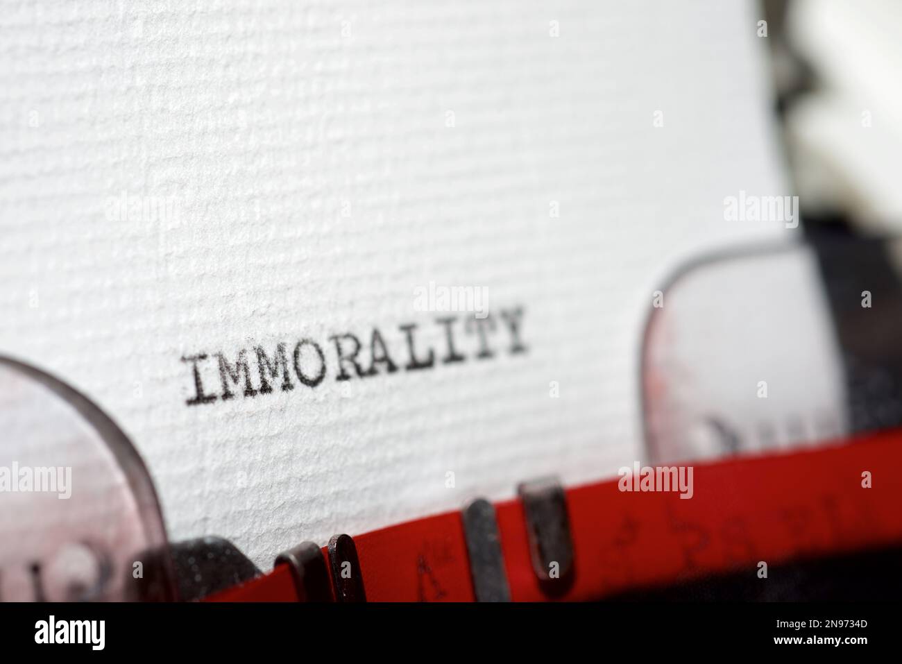 Immorality word written with a typewriter Stock Photo - Alamy