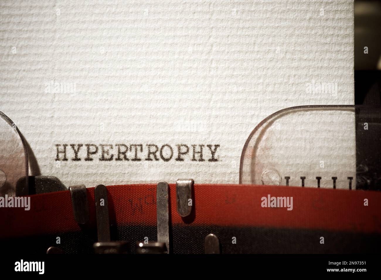 Hypertrophy word written with a typewriter Stock Photo - Alamy