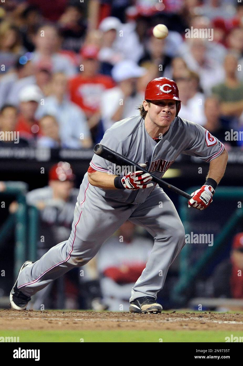 Cincinnati Reds' Ryan Hanigan bunts during a baseball game against the ...