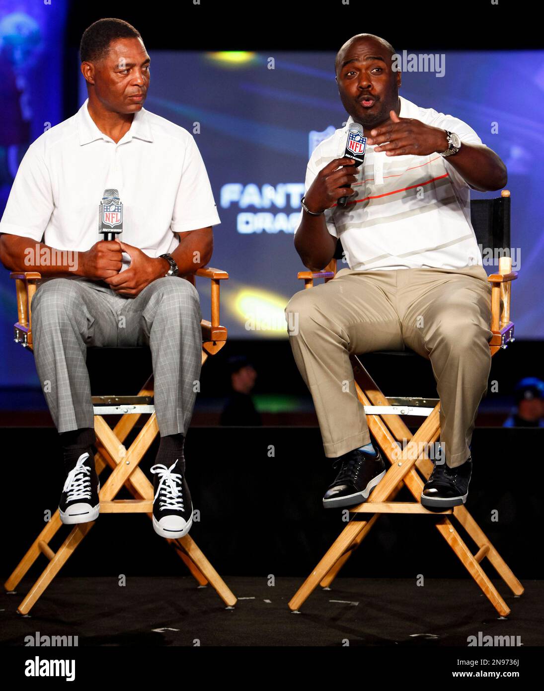 Former NFL running backs Marcus Allen and Marshall Faulk are seen ...