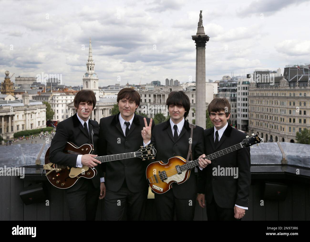 Stephen Hill, left, as George Harrison, Reuven Gershon, second left, as ...