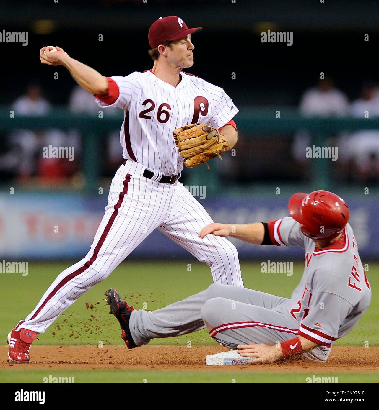 Philadelphia Phillies' Chase Utley forces Cincinnati Reds' Todd Frazier ...