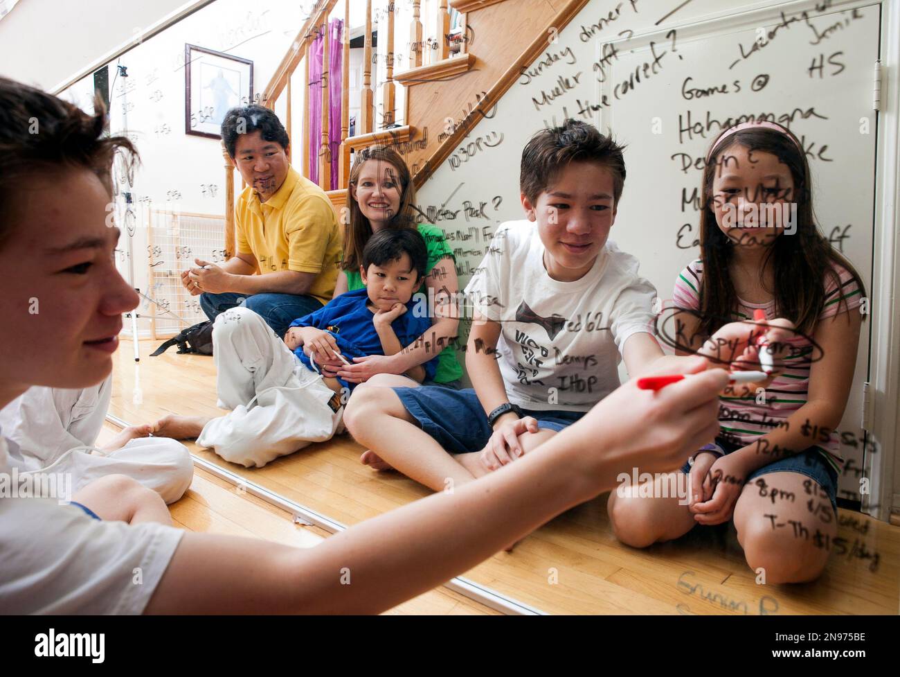 In this photo taken Tuesday, Aug. 14, 2012, David Oh, a flight director ...