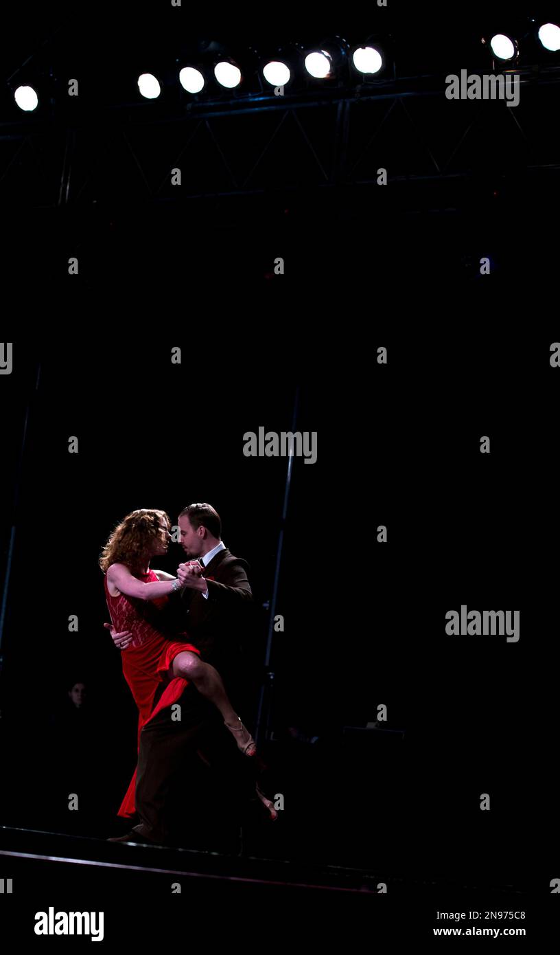 A tango dance couple compete in the stage category at the Tango Dance ...