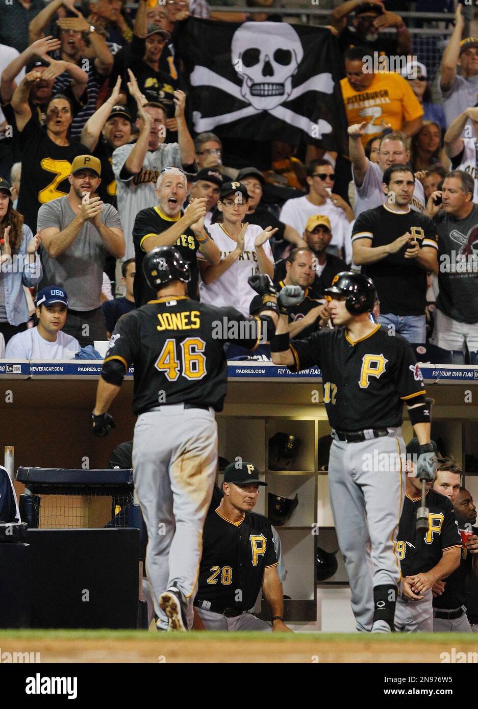 Pittsburgh Pirates' Garrett Jones is congratulated by Clint Barmes as ...
