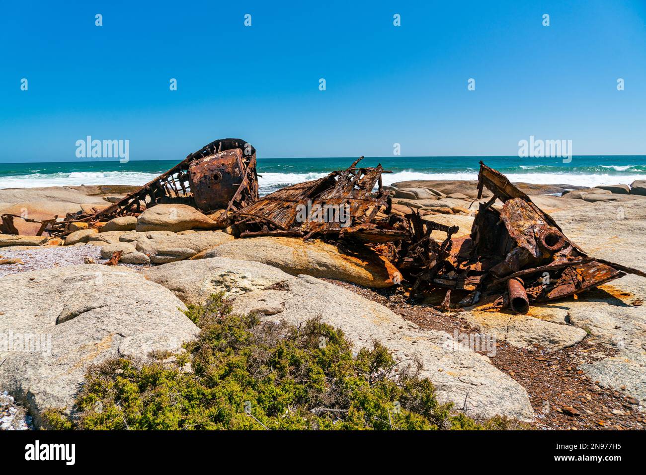 The wreck of the Aristea lies on the rocks on the Atlantic Ocean coast ...
