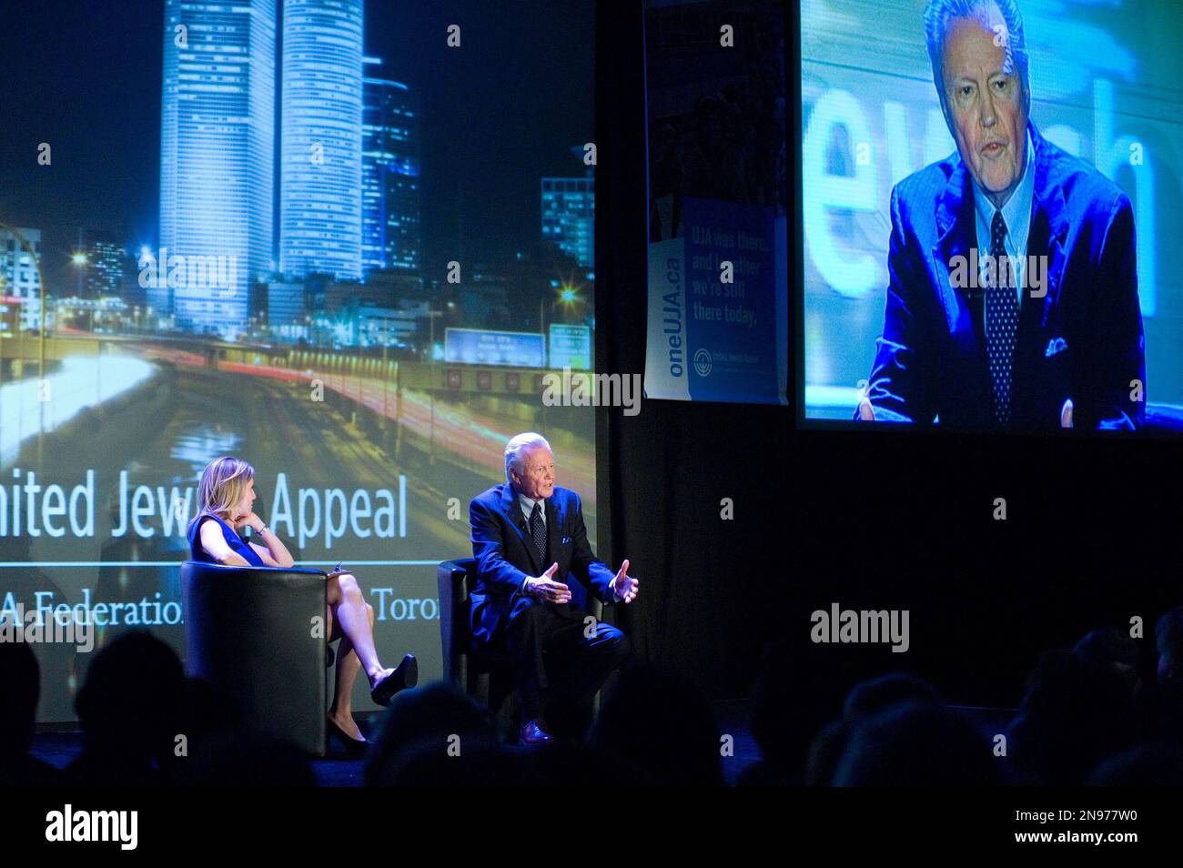 Television personality Liza Fromer, left, and actor Jon Voight speak ...