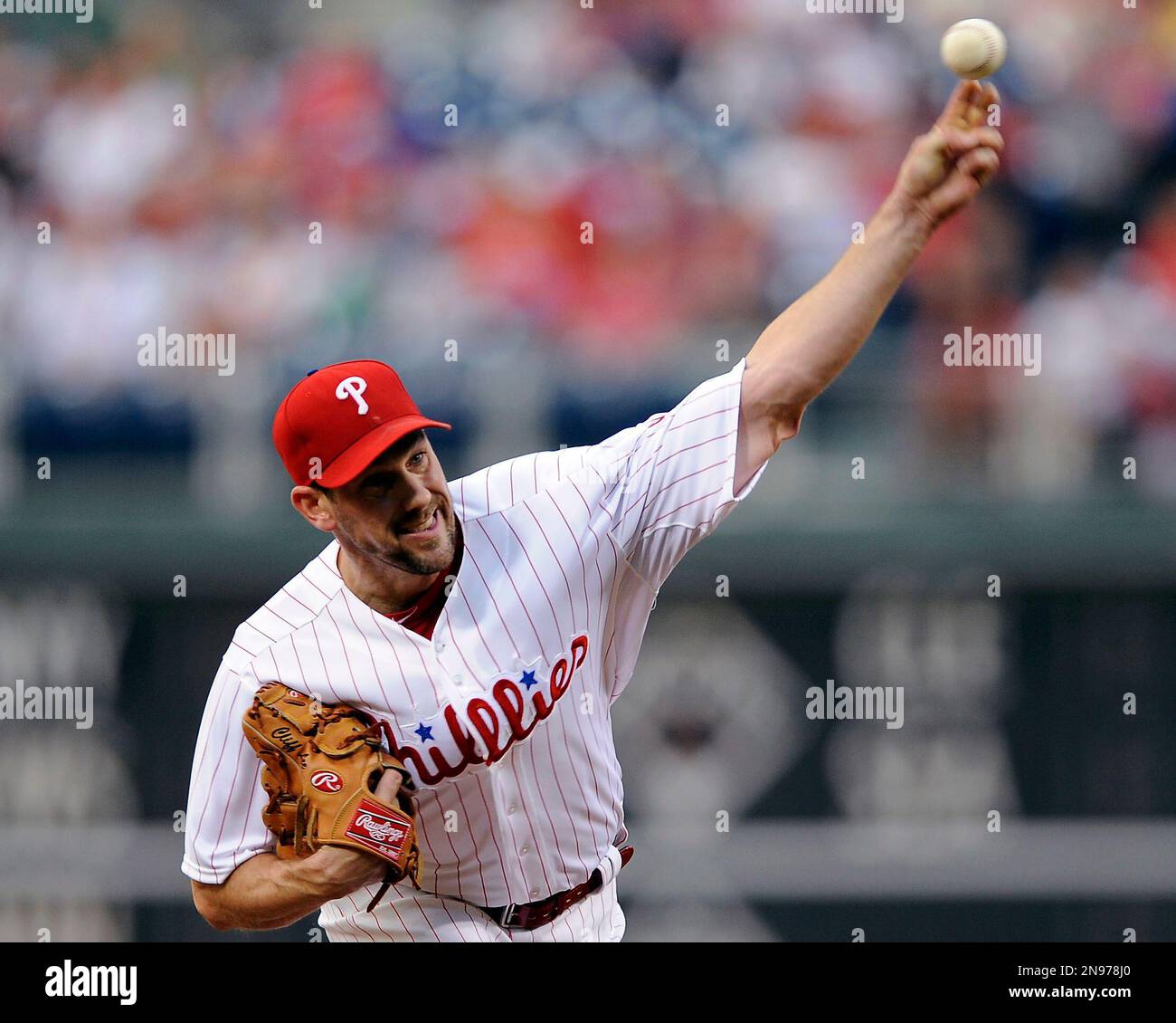 Philadelphia Phillies' Cliff Lee throws a pitch in the first inning of ...