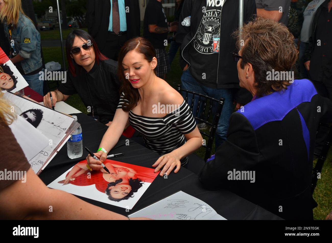 From left John Cafiero, Rose McGowan and Slim Jim Phantom attend the ...