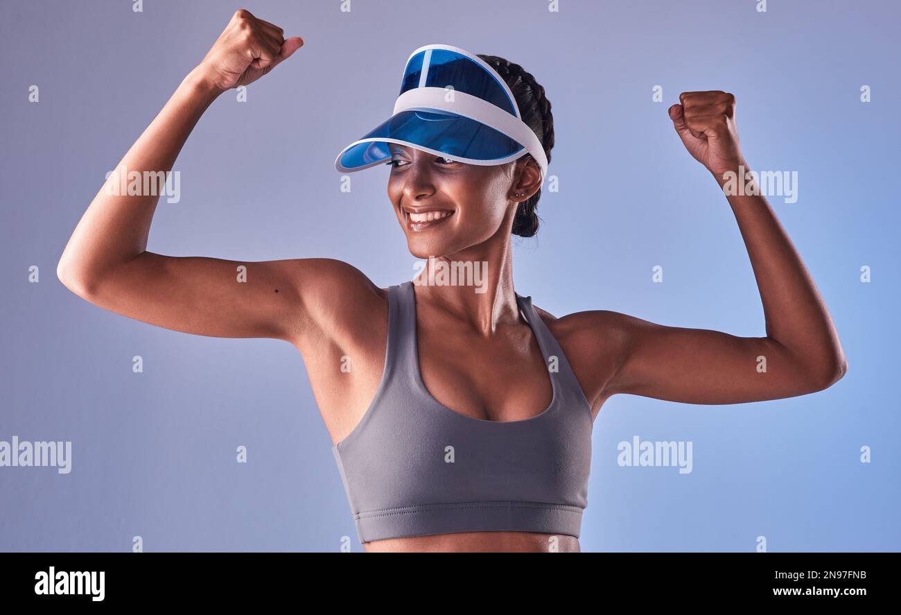 Your body is as strong as you decide it to be. Studio shot of a fit ...