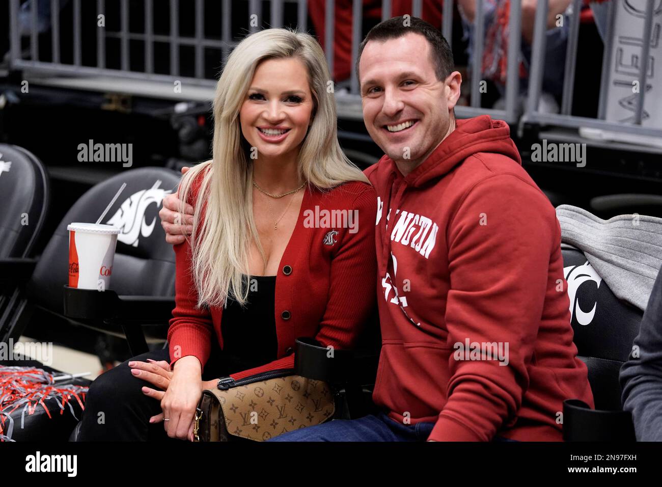 Washington State football head coach Jake Dickert, right, and his wife ...