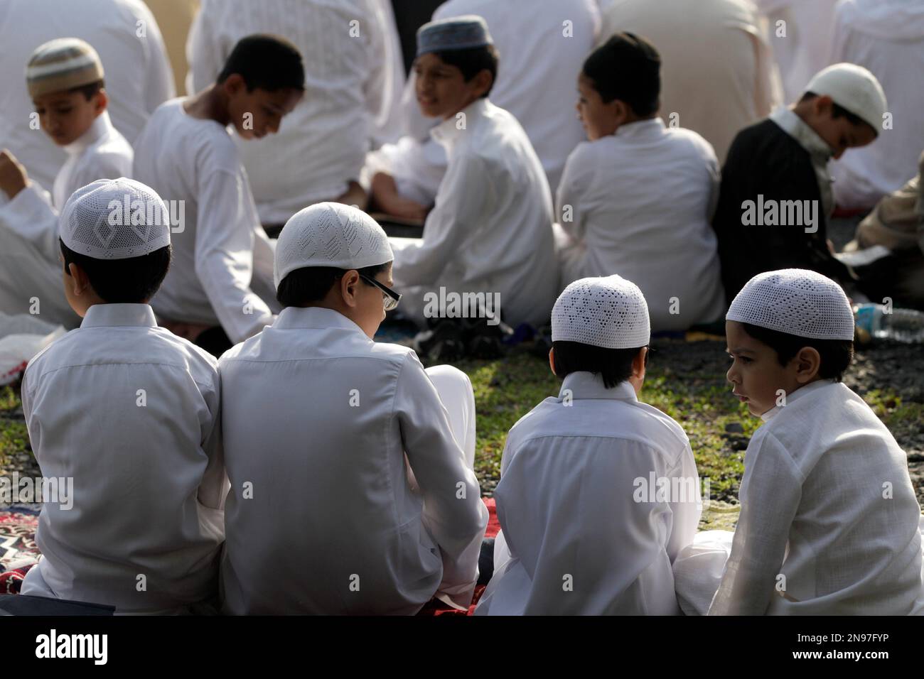Panama's Muslims children attend Eid al-Fitr prayer, which marks the ...