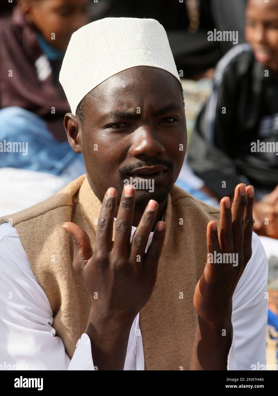 A Kenyan Muslim performs during Eid al-Fitr prayers at the end of the ...