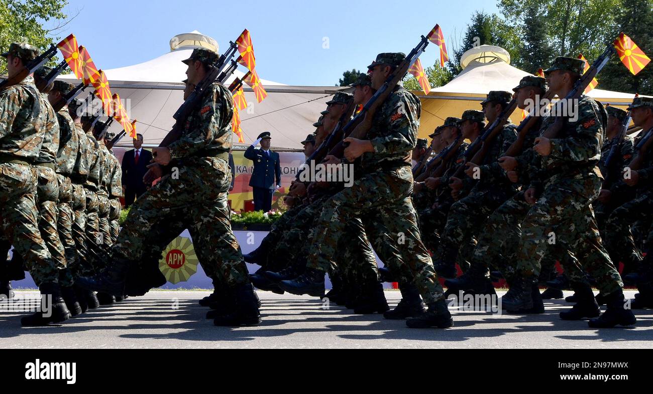 Macedonian Army soldiers march during a parade in honor of the 20th ...