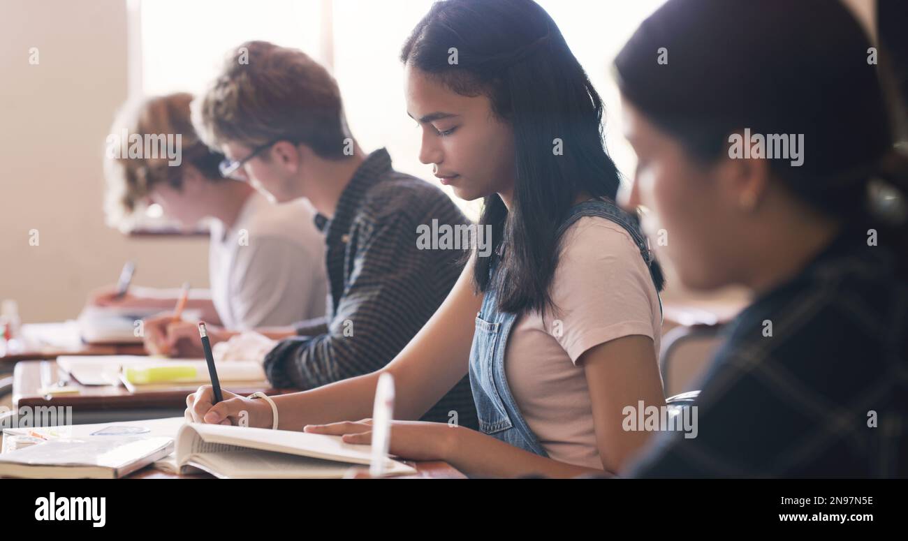 Diverse teenagers exam school writing hi-res stock photography and ...