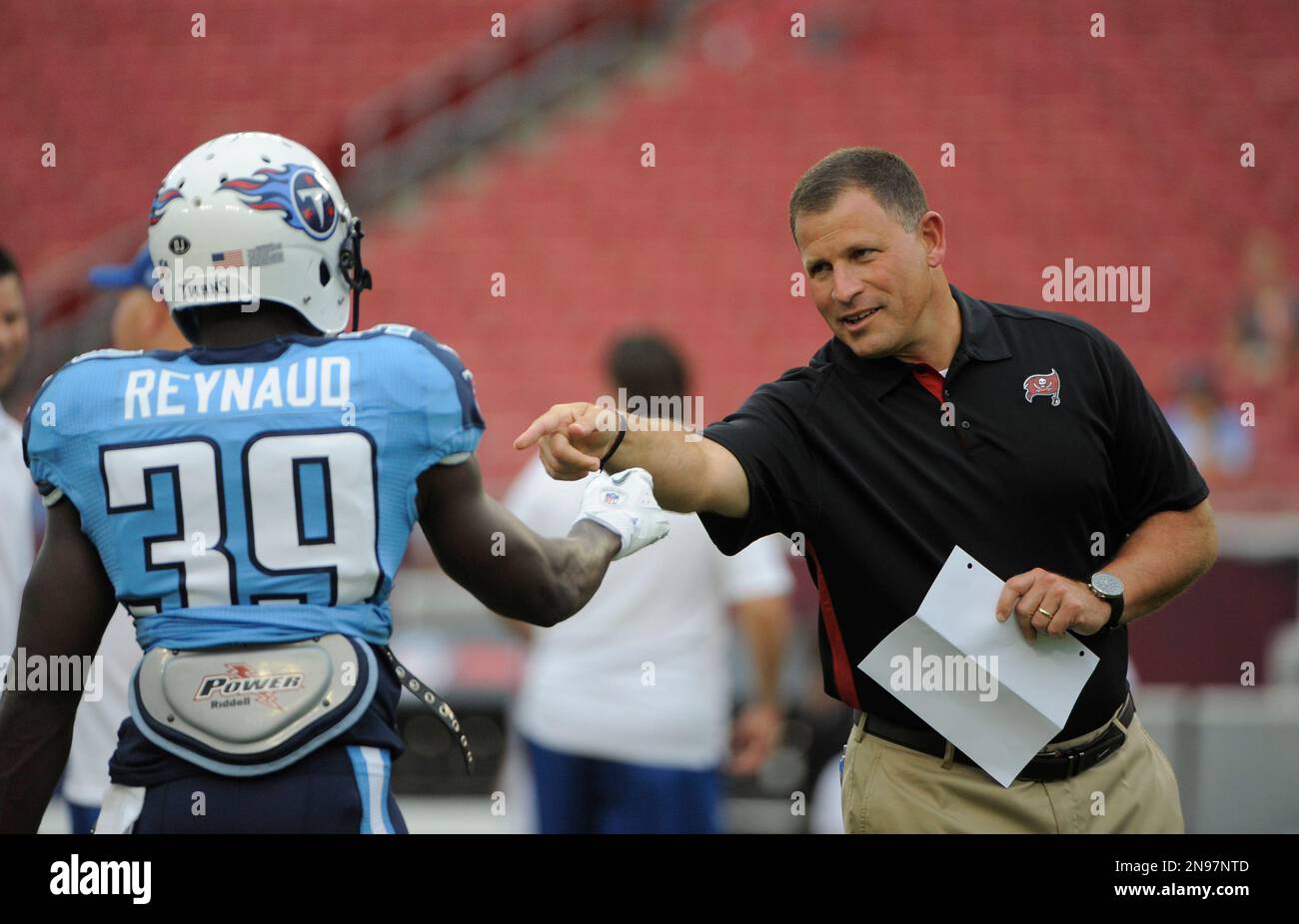 Tampa Bay Buccaneers head coach Greg Schiano, right, speaks with ...