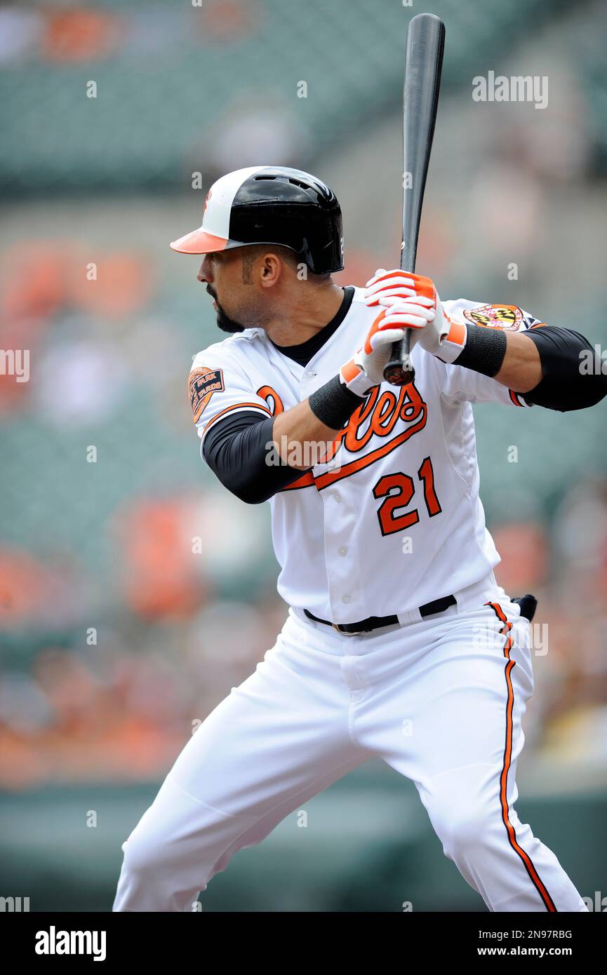 Baltimore Orioles' Nick Markakis (21) bats during a MLB baseball game ...