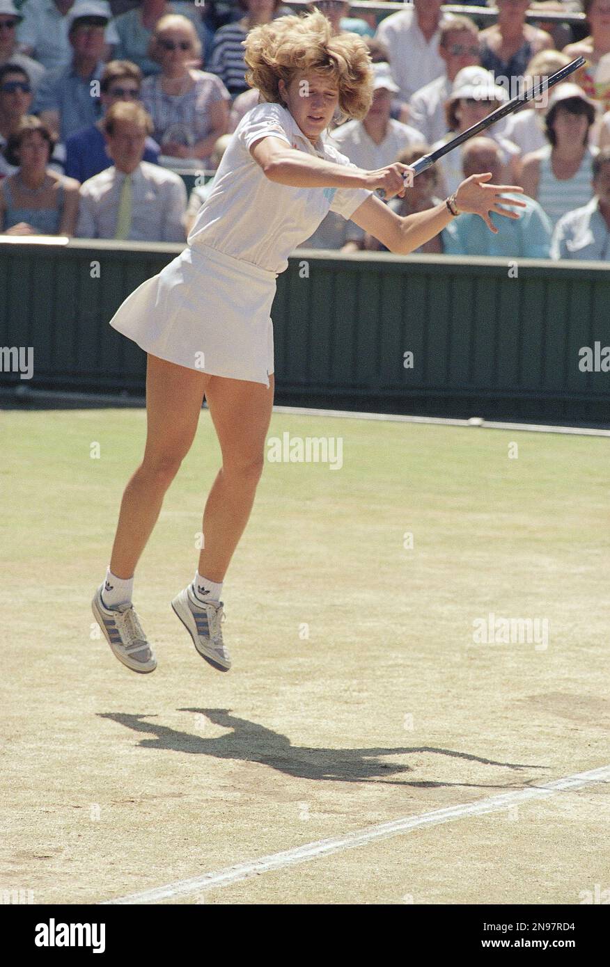 Steffi Graf returns a shot from defending champion Martina Navratilova ...