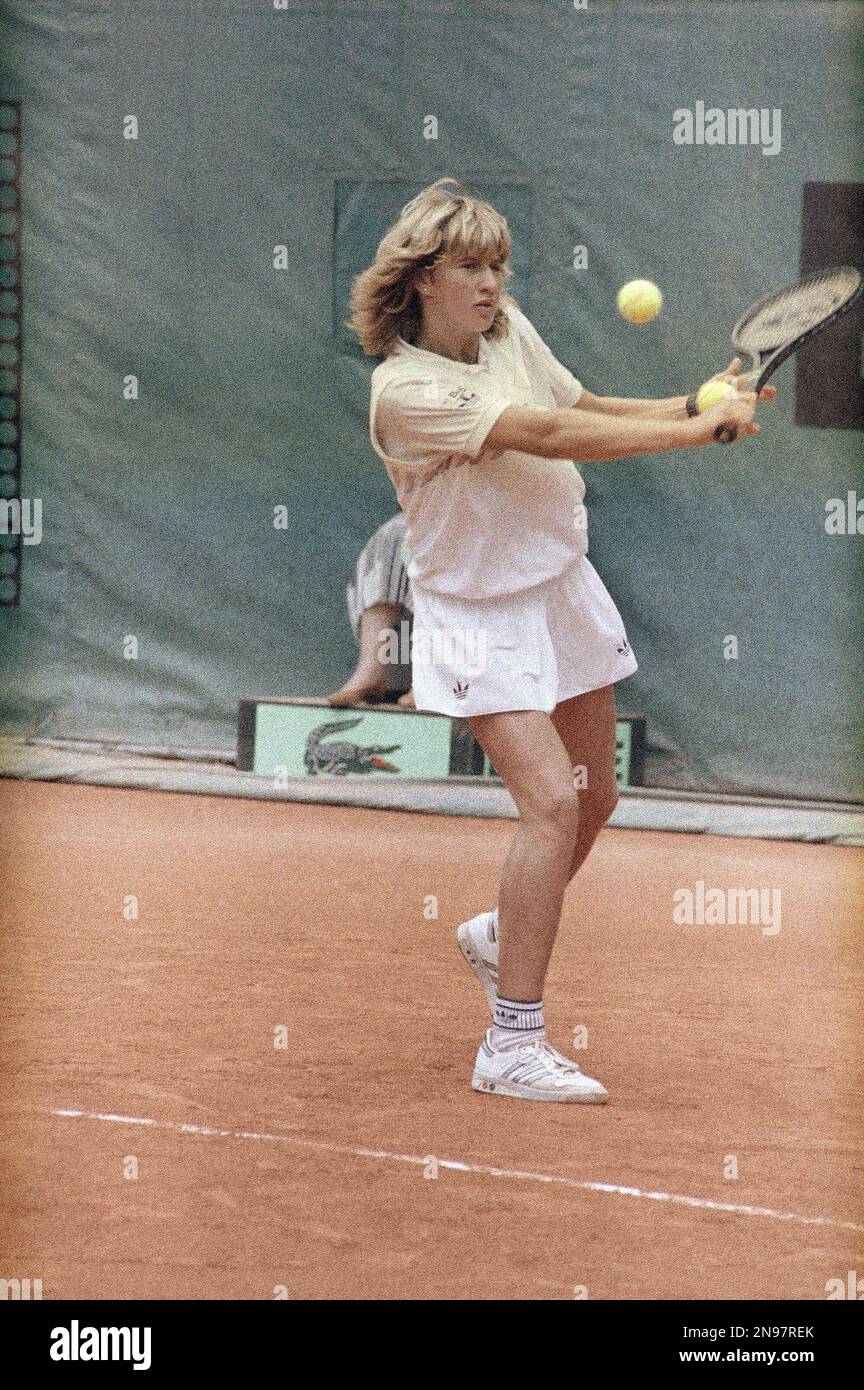 Steffi Graf backhands the ball to Pam Casale whom she defeated in two ...