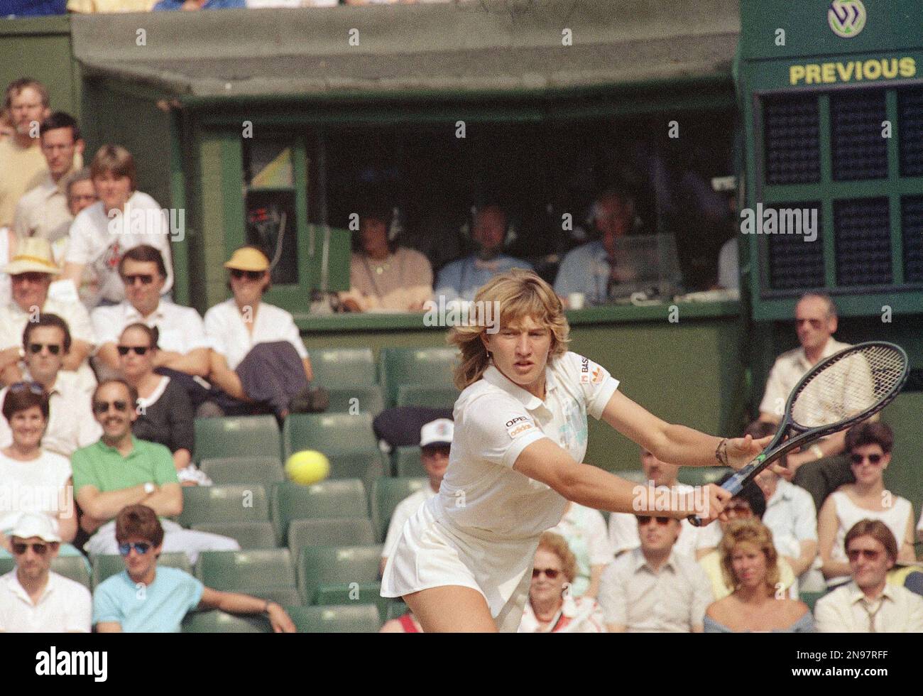 Steffi Graf stretches to reach a shot from Pam Shriver, during their ...