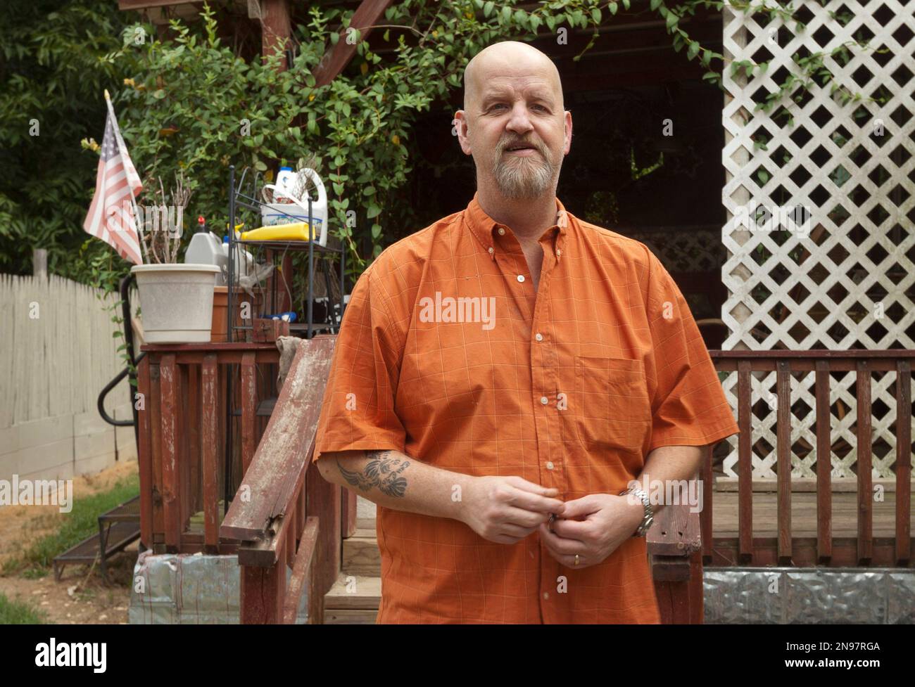 In this photo taken Aug. 13, 2012, John Mark Byers, adoptive father of ...