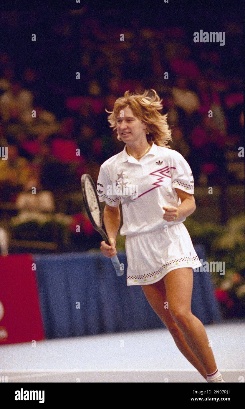 Steffi Graf reacts after winning the match point in her defeat of ...