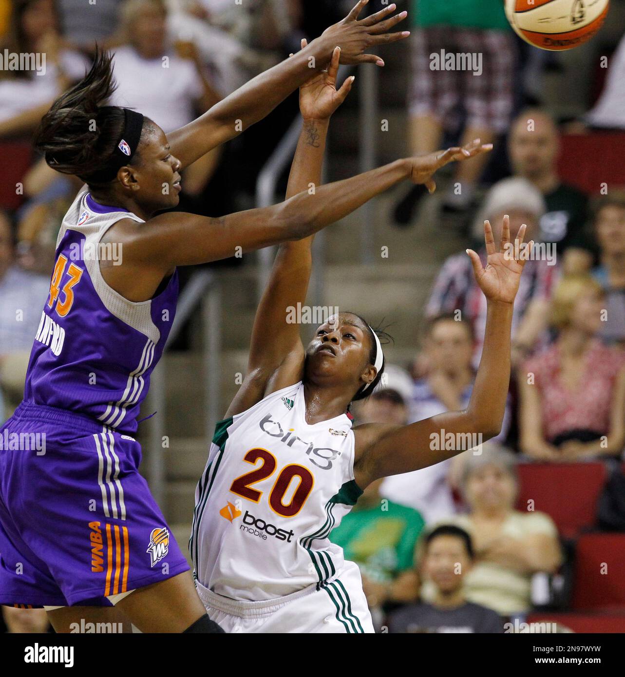 Seattle Storm's Camille Little (20) defends as Phoenix Mercury's Nakia ...