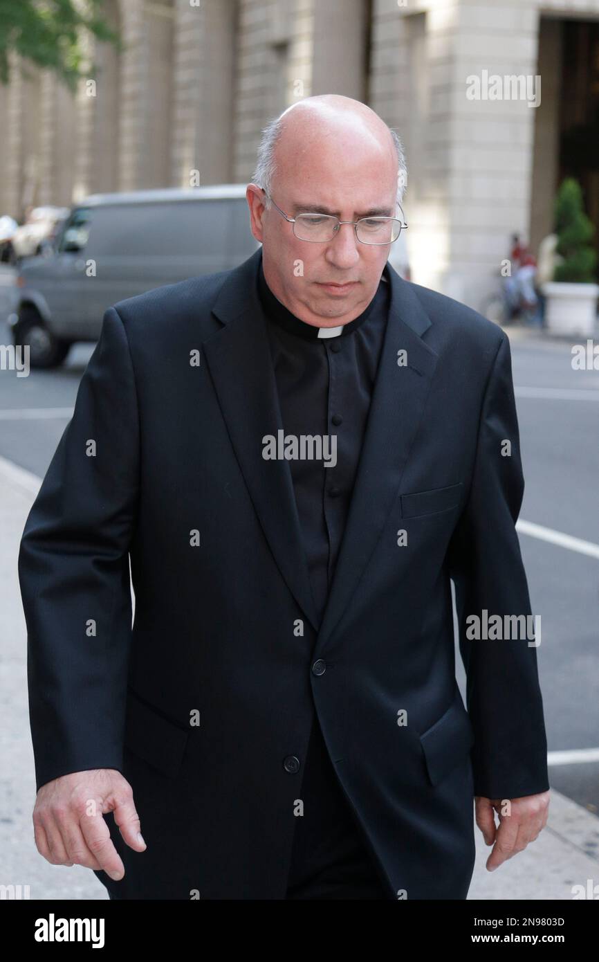 The Rev. Andrew McCormick walks from the Criminal Justice Center after ...