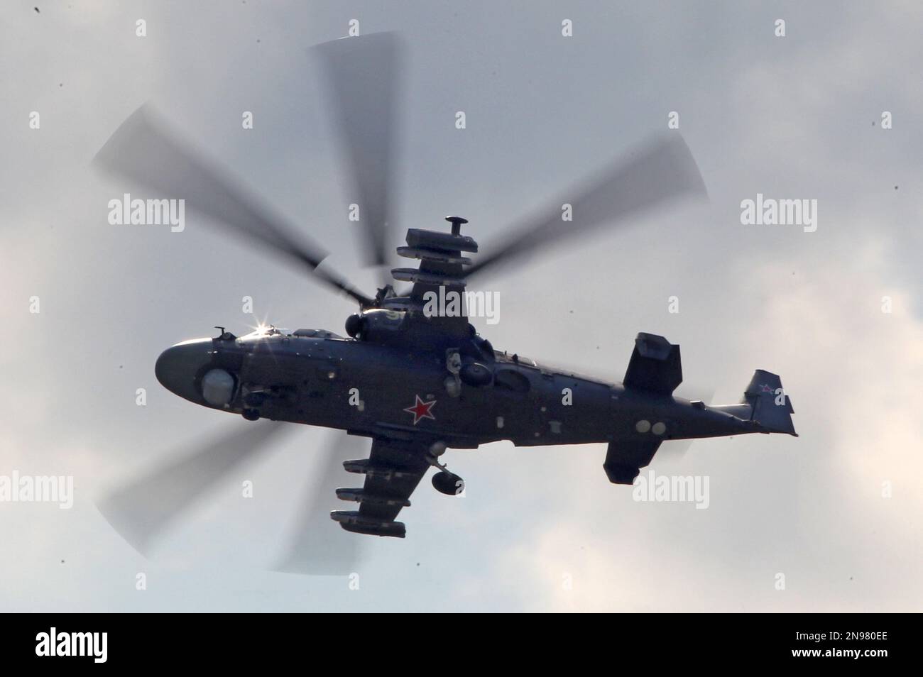 Russian made Ka-52 Alligator attack helicopter in flight during a ...