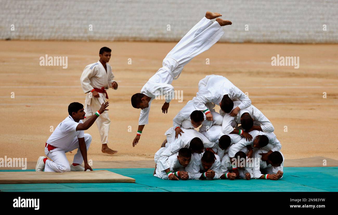 Indian army soldiers demonstrate a martial art technique on the ...