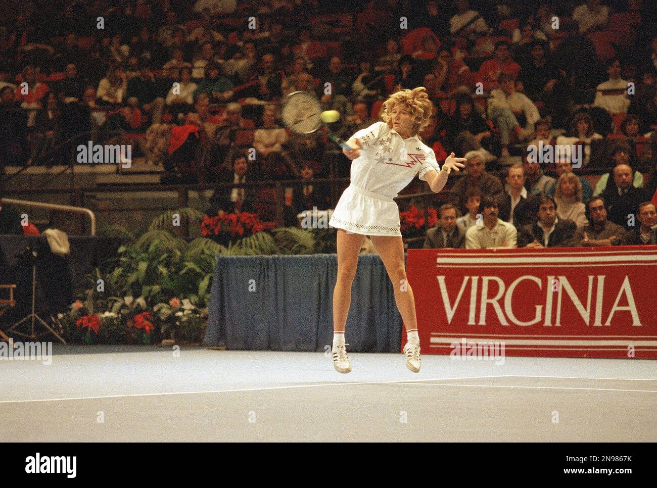 Steffi Graf jumps up for a ball during her finals match against ...