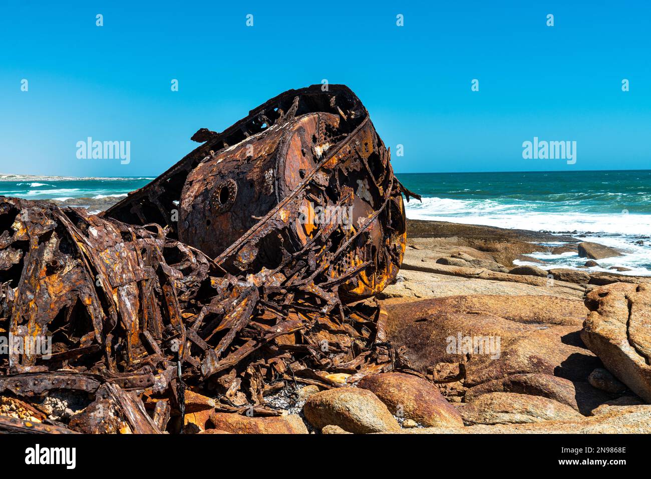 The wreck of the Aristea lies on the rocks on the Atlantic Ocean coast ...