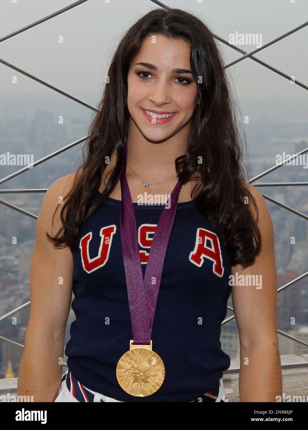 Aly Raisman, of the 2012 US Women's Gymnastics Olympic Team, poses on ...