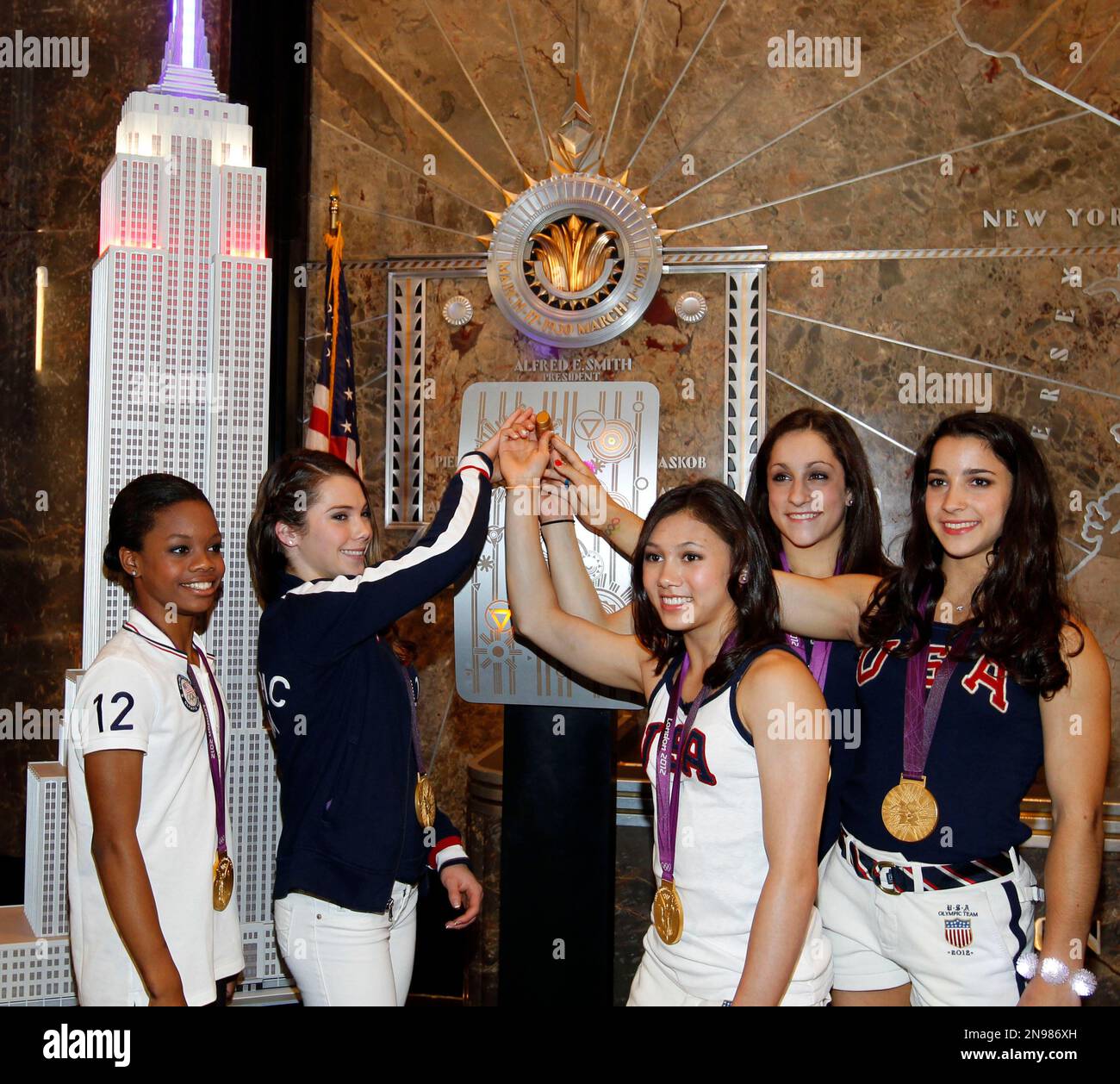 Members of the 2012 US Women's Gymnastics Olympic Team, from left ...
