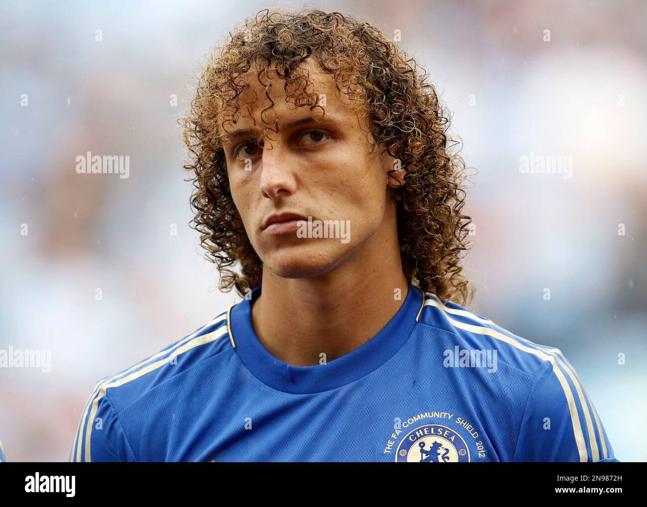 Chelsea's David Luiz looks on during a line-up before the start of ...