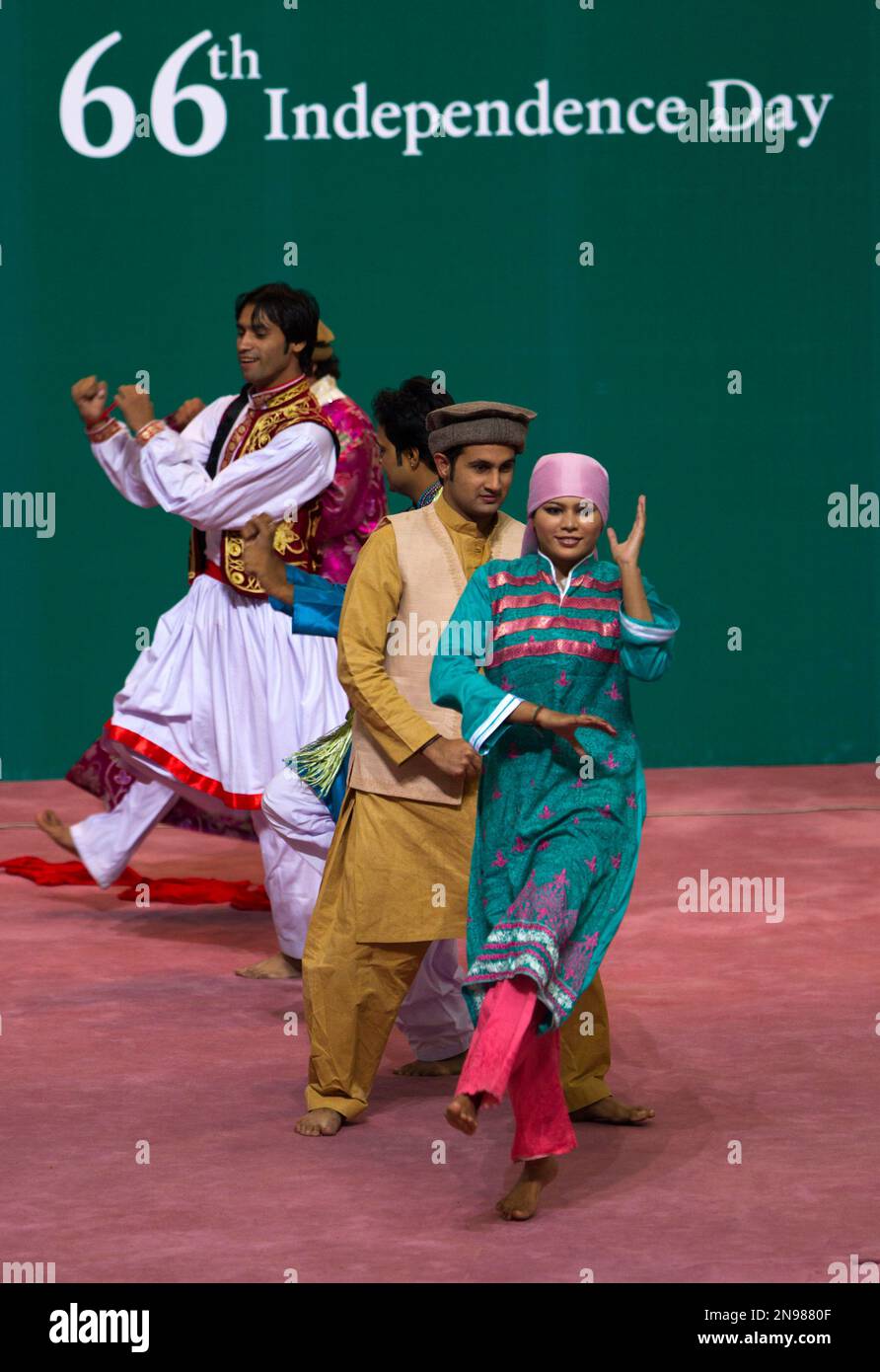 Dancers perform Kashmiri folk dance in a ceremony to celebrate the ...