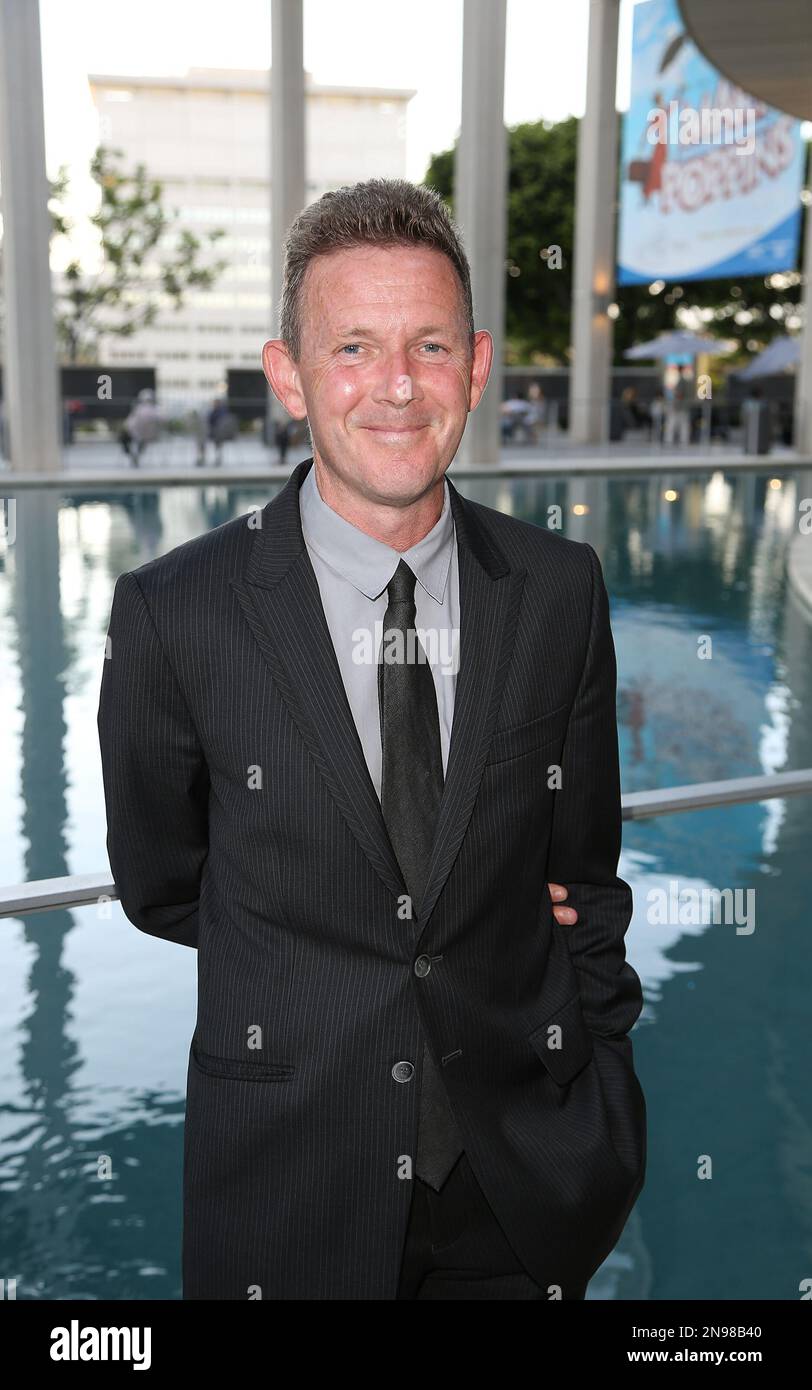 Playwright John Logan poses during the arrivals for the opening night ...