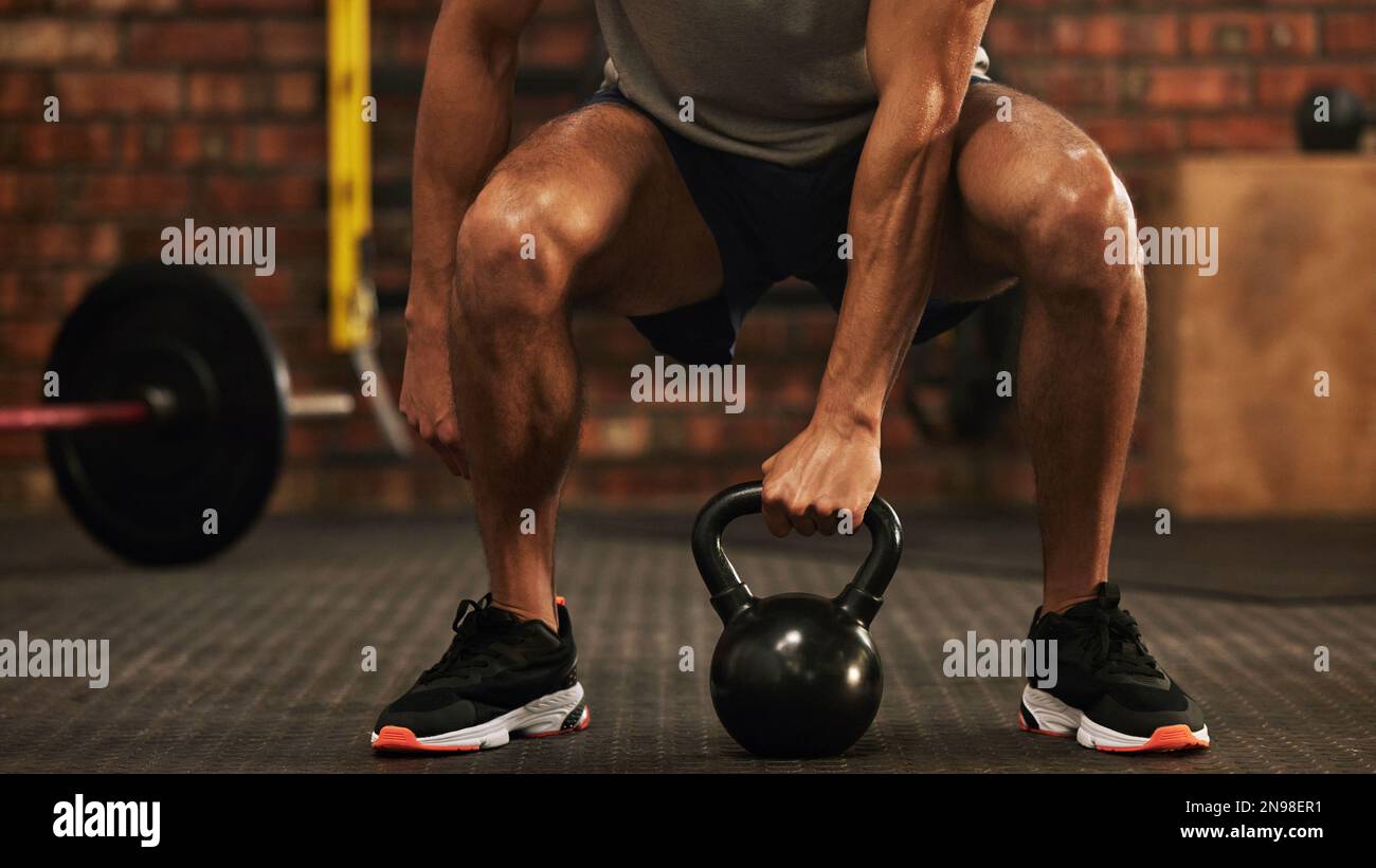 Muscles made by the fitness gods. an unrecognisable man working out ...