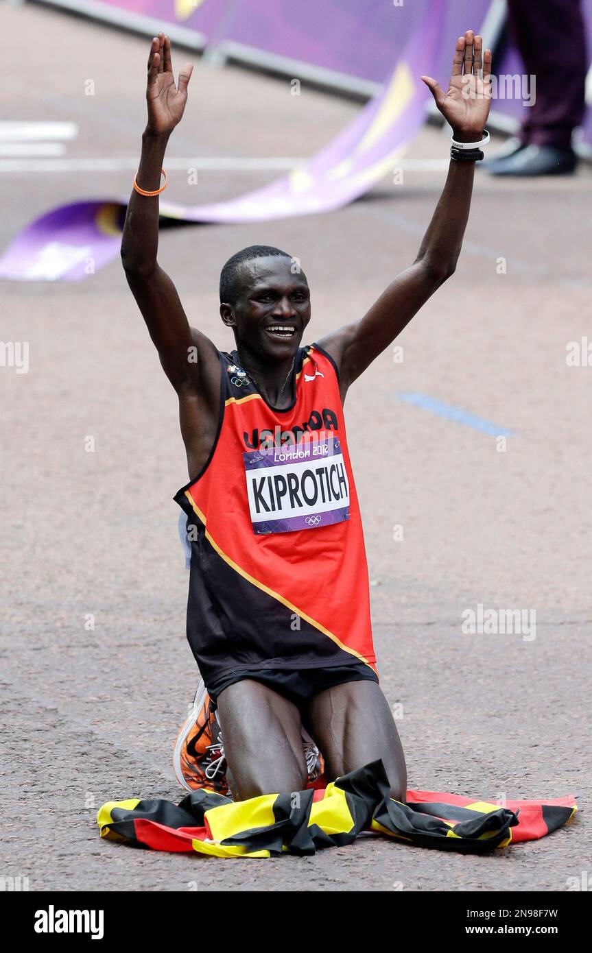 Gold-medalist Stephen Kiprotich of Uganda celebrates after the men's ...