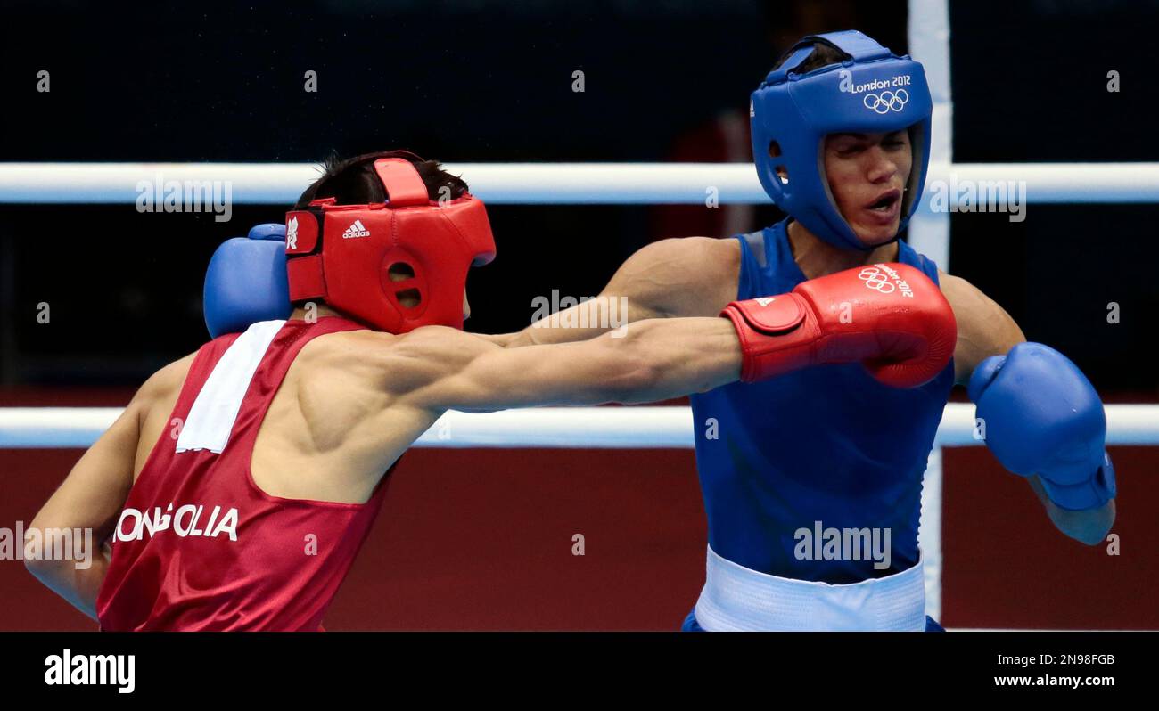 Mongolia's Tugstsogt Nyambayar, left, fights Cuba's Robeisy Ramirez ...