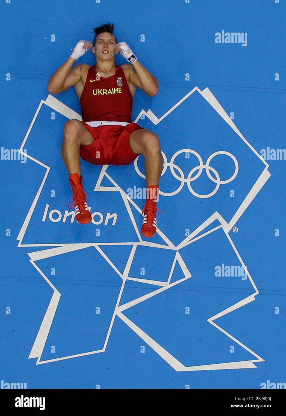 Ukraine's Oleksandr Usyk celebrates after defeating Italy's Clemente ...