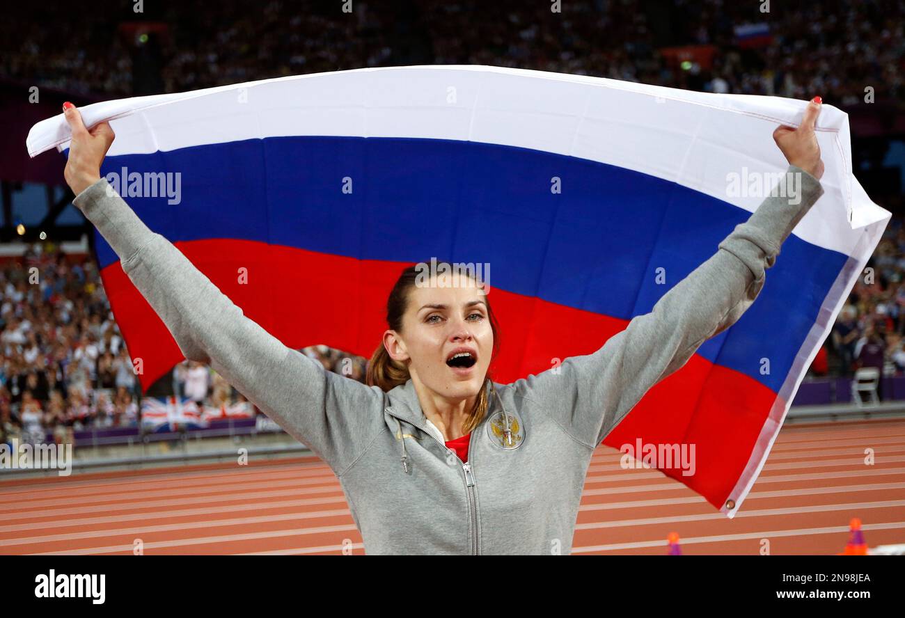 Russias Anna Chicherova Celebrates After She Won Gold In The Womens High Jump Final During The